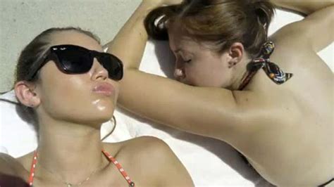 Miley Cyrus In Personal Photos On Vacation And Sexy In See Thru Dress