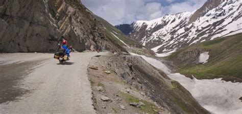 A Bike Rider Crossing The Zojila Pass At An Elevation Of 11 000 Ft At