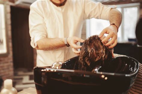 Barber Massages Head Client Nanansit Shampoo For Hair Concept