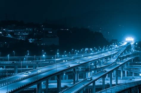 Premium Photo At Nightthe Intersecting Multi Storey Overpass In Chongqing China