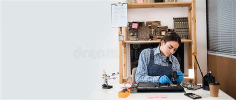 Repairman Woman Disassembling Laptop Motherboard And Cooler Fan