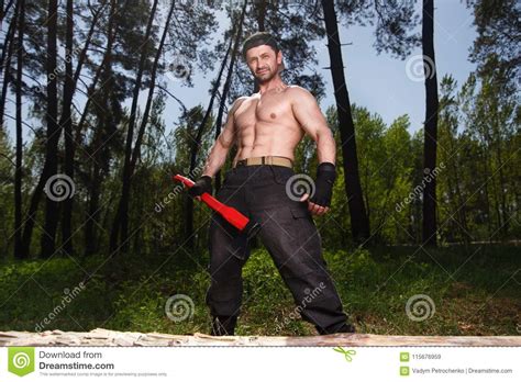 Lumberjack Worker Standing In The Forest With Axe Stock Image Image