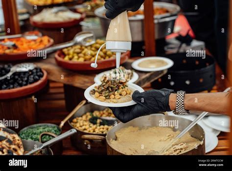 Variety If Israeli Food Served With Salad Pita Bread And Appetizers