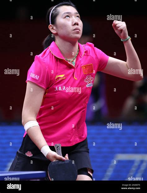 Li Xiaoxia Of China Reacts As She Won A Point Against Singapores Feng Tianwei During Their