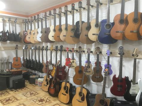 გიტარების ფართო არჩევანი მაღაზია აკუსტიკა Acoustic Ge