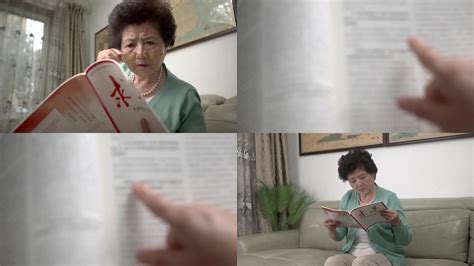 独居老人看书看杂志老人视力模糊老花眼视频素材下载