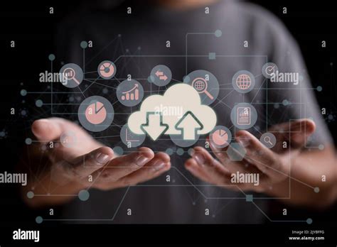 Chart And Graph Icons On A Digital Screen Interface And A Businessman