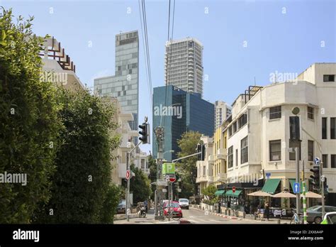 Modern High Rise Buildings And Houses In The Style Of Classical