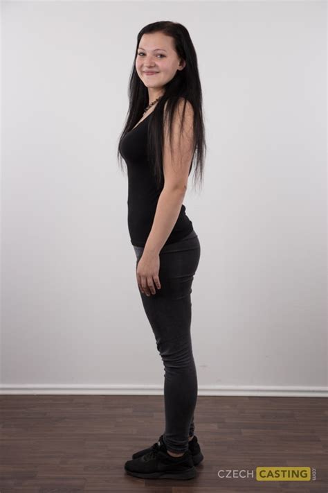 Sexy Brunette Daniela Takes A Seat On A Stool After Getting Completely Naked