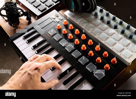 Close Up Man S Hand On The Keys Of A Midi Keyboard Modern Studio Equipment New Technologies