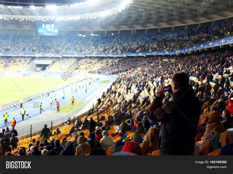 Fans Watching Football Game Stadium Image And Photo Bigstock