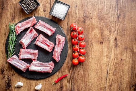 Premium Photo Raw Pork Ribs On Wooden Background