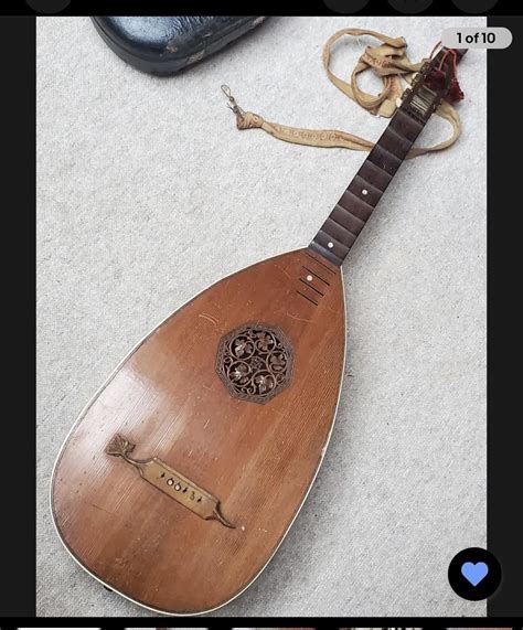 Is This A Lute If It Is How Much Would It Be To Replace The Strings