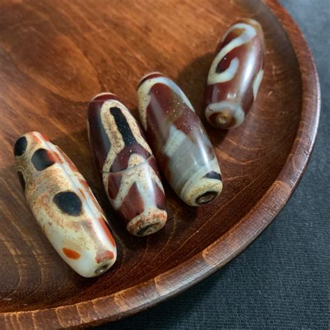 七錣品阿卡紅玉髓天珠 貴人天珠 龜甲天珠 西藏天珠 DIYdiy 配件 佛教神明 天然瑪瑙礦石 特殊圖騰 藏傳宗教 蝦皮購物