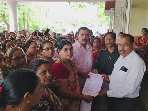Anganwadi Workers And Assistants Staged A Dharna For Five Hours Over