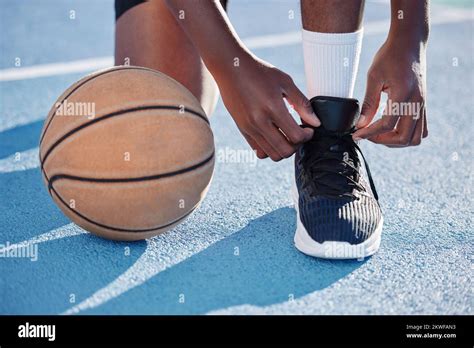 Fitness Man On A Court With A Basketball For Training Exercise And A