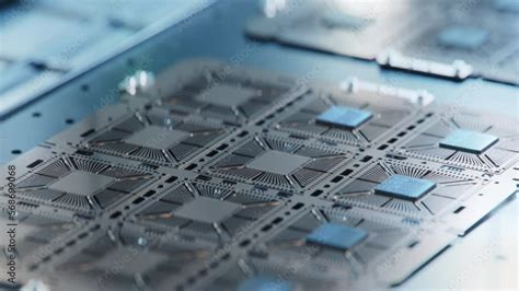 Semiconductor Packaging Process Close Up Of Extracted From Semiconductor Wafer Silicon Dies Are