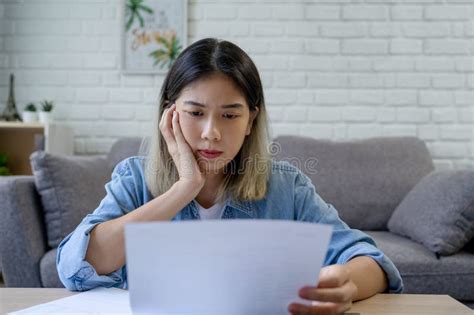 Financial Household Debt Concept Stressed Young Asian Woman Trying To