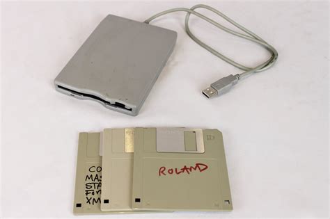 usb floppy disk reader and 3 floppies with midi programming