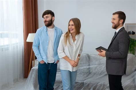Free Photo Male Real Estate Agent Doing Business And Showing House To
