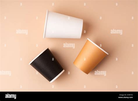 Paper Cups Stacked On A Neutral Background For A Visually Appealing