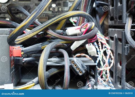 Very Dirty Wires Connectors And Plugs In The Computer Old Multi Colored Wires In A Braided