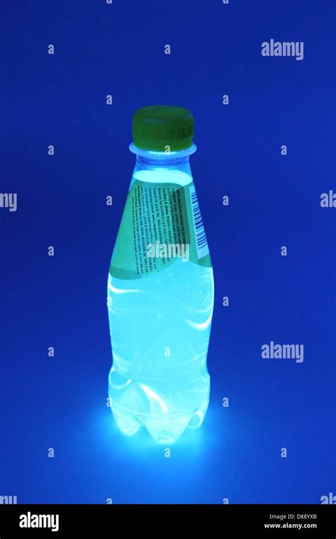 Small Unbranded Tonic Water Bottle Under Ultraviolet Uv Light The