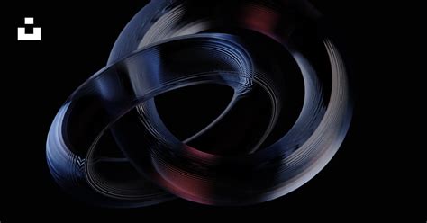 A Black Background With Two Circular Objects In The Middle Photo Free