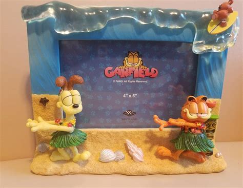 Tiki Hula Bobble Frame Garfield By Westland 2398 Odie Dancing Pokie