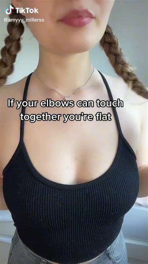 Tiktok User Amyyymillerss Squeezing Her Clothed Boobs Together With