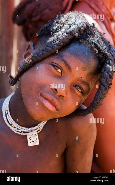 Portrait Of A Young Girl Of The Traditional Namibian Himba Tribe Stock