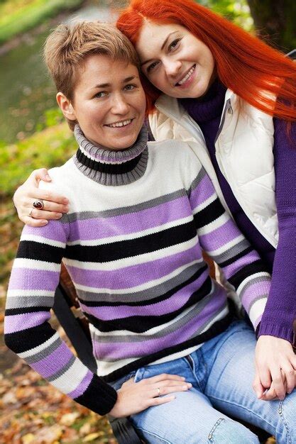 Premium Photo Two Pretty Girls Walking In Autumn Park