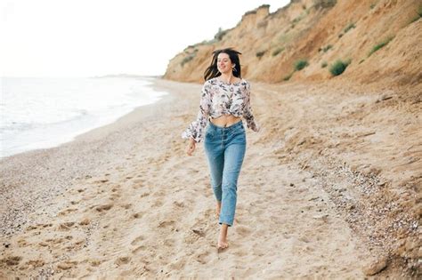 Premium Photo Stylish Hipster Girl Running On Beach At Sea And