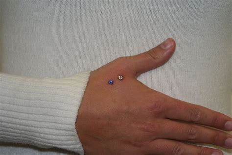 Dermal Piercing Hand