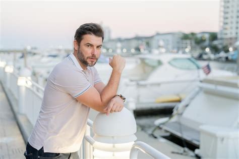 Premium Photo Portrait Of Handsome Confident Stylish Man In Big City