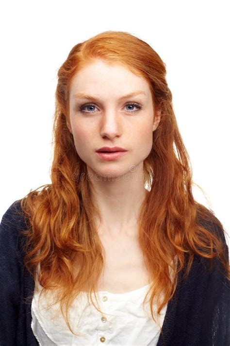 Nothing Beats An Intense Stare An Attractive Redhead Looking At The Camera With A Serious