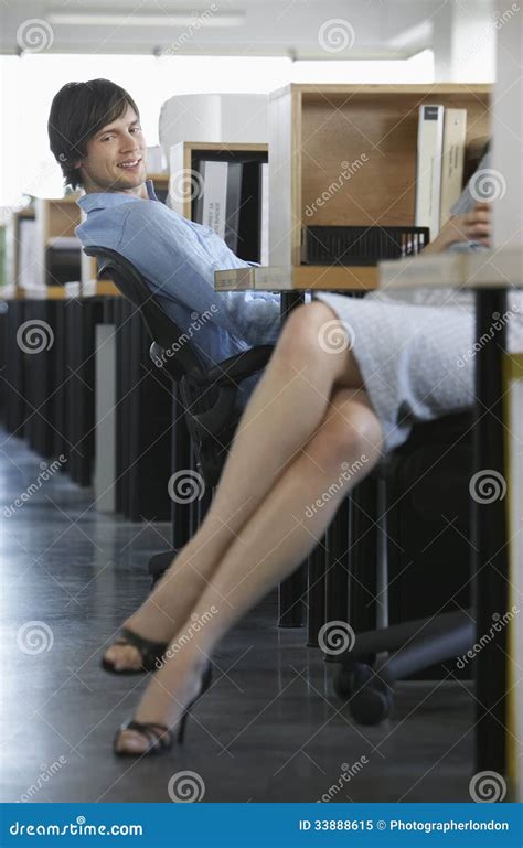 Man Looking At Female Colleagues Legs Stock Image Image 33888615