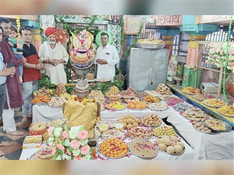 The Tableau Of Chappan Bhog Was Decorated Gathered To Get The Prasad