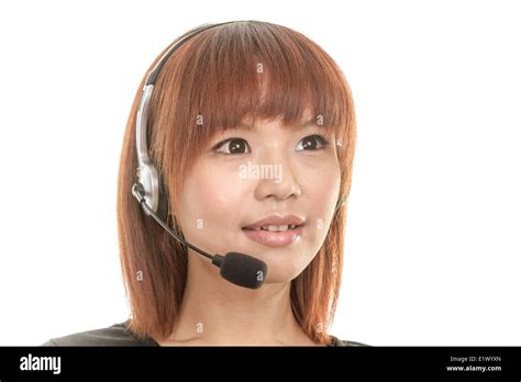 Asian Female Wearing A Headset With Microphone Stock Photo Alamy