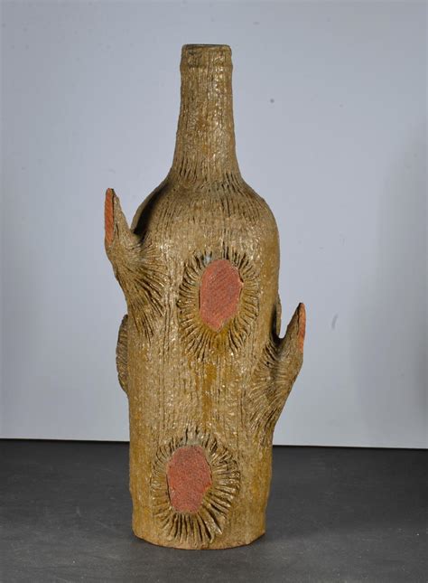 Sold At Auction VINTAGE FAUX WOOD TREE BARK BOTTLE