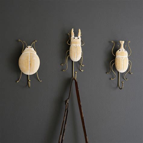 Set Of Three Carved Bug Wall Hooks Whimsical And Functional Decor