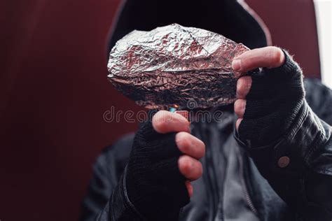 Drug Addict Smoking Opium On Tin Foil Stock Image Image Of Heating Hoodie 188017799