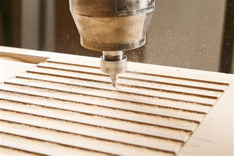 Cnc Machine At Carpentry Workshop Cutting Wood With Various Router Bits Stock Image Image Of