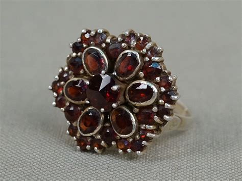 Кольцо серебро по реактиву 925 пробы гранаты общий вес 5 36г Размер кольца 16 5