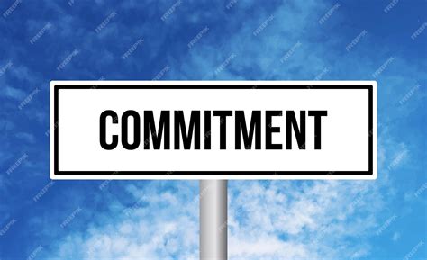 Premium Photo Commitment Road Sign On Blue Sky Background