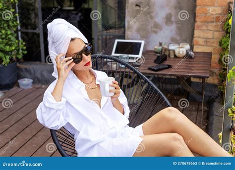 Gorgeous Young Woman Having Morning Coffee And Smoking Cigarette While