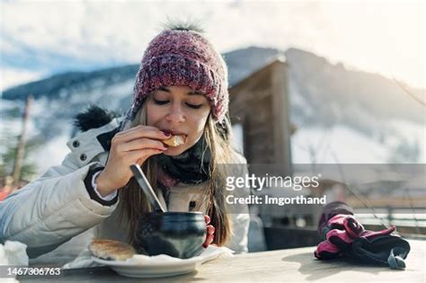 Teenage Girl Enjoying Hot Goulash Soup In An Outdoors Restaurant On A