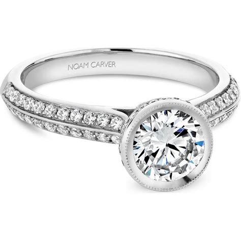 Round Cut Diamond Engagement Ring With Bezel Setting And Pavé Band In