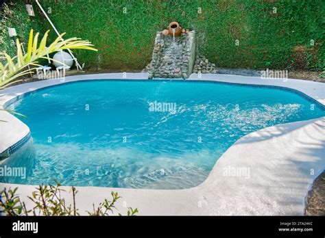 Swimming Pool Designs For The Home Crystal Water Home Pool Surrounded