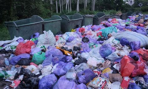Piles Of Garbage Outside Empty Bins Neglected Environmental Hygiene